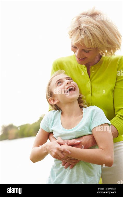 Grandmother Playing With Granddaughter Outdoors Stock Photo Alamy
