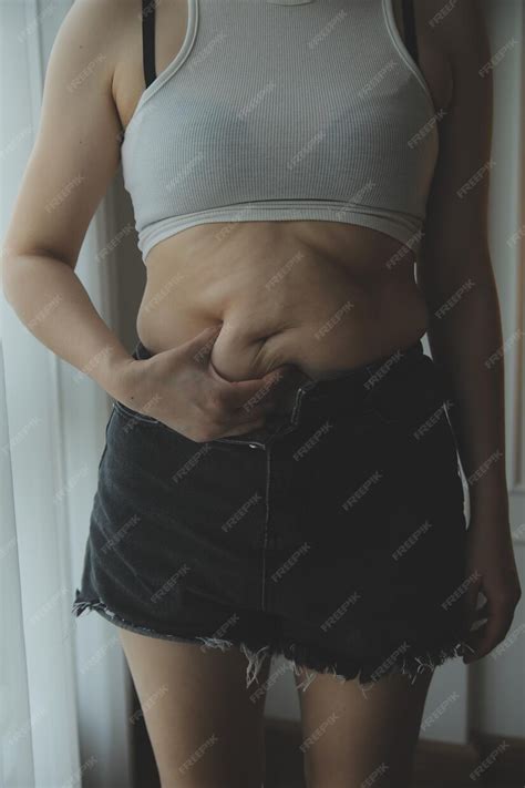 Premium Photo Fat Woman Fat Belly Chubby Obese Woman Hand Holding