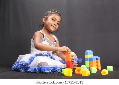 Indian Cute Girl Playing On Black Stock Photo 1391142164 Shutterstock