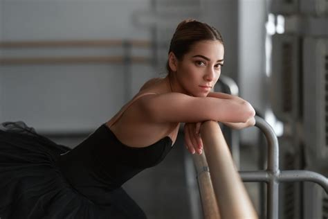 Premium Photo Female Ballet Dancer Resting After Rehearsal