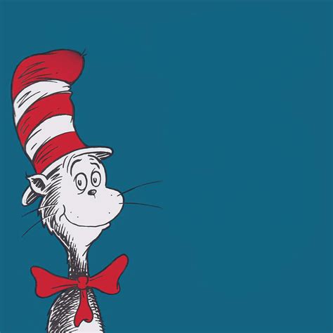 Download A Cat In The Hat Is Standing On A Blue Background