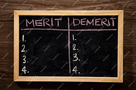 Premium Photo Blackboard With Merit And Demerit Words