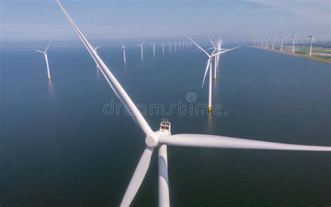 Drone Aerial View At Windmill Park With Windmills Turbines In The Ocean