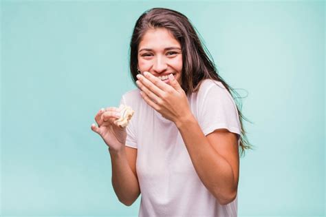 Free Photo Brunette Girl Eating Pastry
