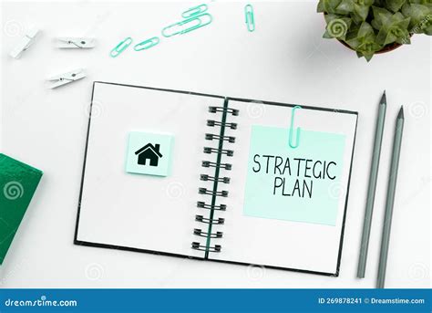 Hand Writing Sign Strategic Plan Word For A Process Of Defining