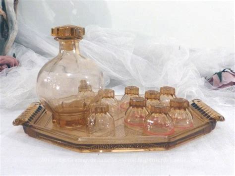 Ancien service à liqueur avec plateau carafe et ses petits verres Le Grenier de Lisette