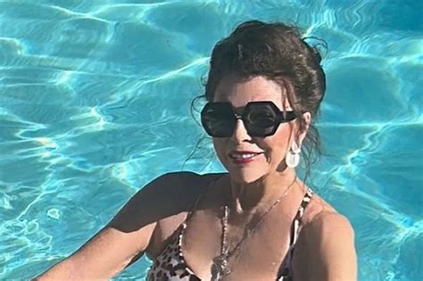 Joan Collins 89 Enjoys Terrific Christmas In Leopard Print Swimsuit