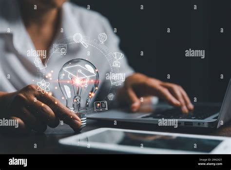 Female Holding Lightbulb Showing Graduation Hat Internet Education