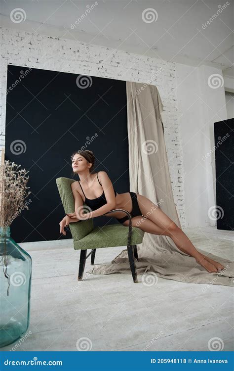 Beautiful Woman Sitting On A Chair Beautiful Smile Natural Makeup
