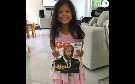 Booba partage une photo de sa fille Luna tenant une couverture de lui pour GQ Décembre
