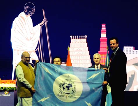 Hm Amit Shah Hands Over The Interpol Flag