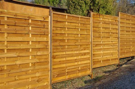 How To Choose The Right Fence For A Sloped Yard Design Tips And