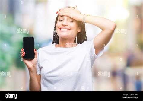 Young Braided Hair African American Girl Showing Screen Of Smartphone