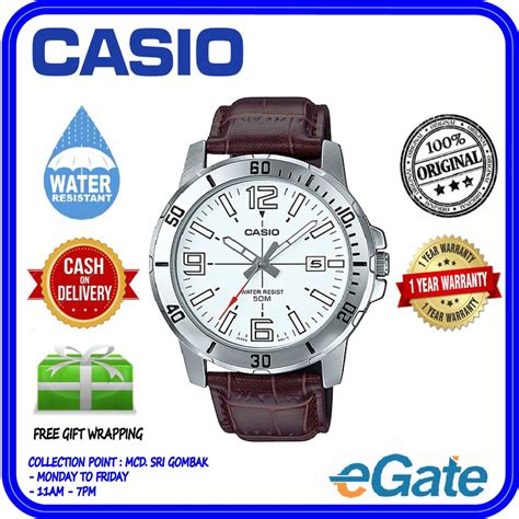 Casio MTP VD01L 7BV Men Analog Date Functioning Brown Leather White Dial Watch MTP VD01L