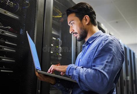 Connectivity Data Center And A Man With A Laptop For Maintenance