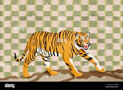 Tiger Against Checked Background Stock Photo Alamy