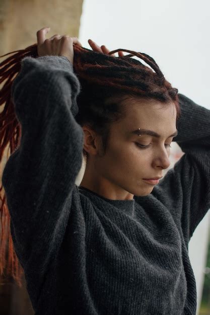 Premium Photo Close Up Portrait Of A Girl With Dreadlocks Making A Hairstyle For Dreadlock