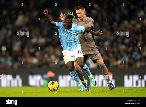 Manchester City S Jeremy Doku Left And Tottenham Hotspur S Giovani Lo