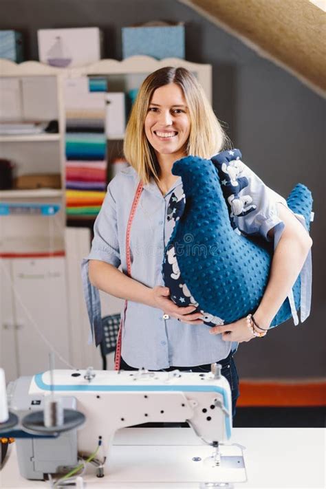 Seamstress Smiling Woman Portrait In Sewing Workshop Stock Image
