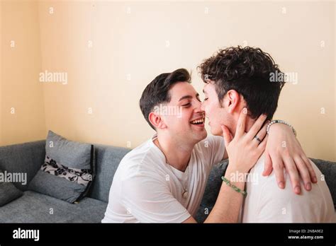 Homosexual Men Couple In Pajamas Kissing And Touching Each Other Lgbt