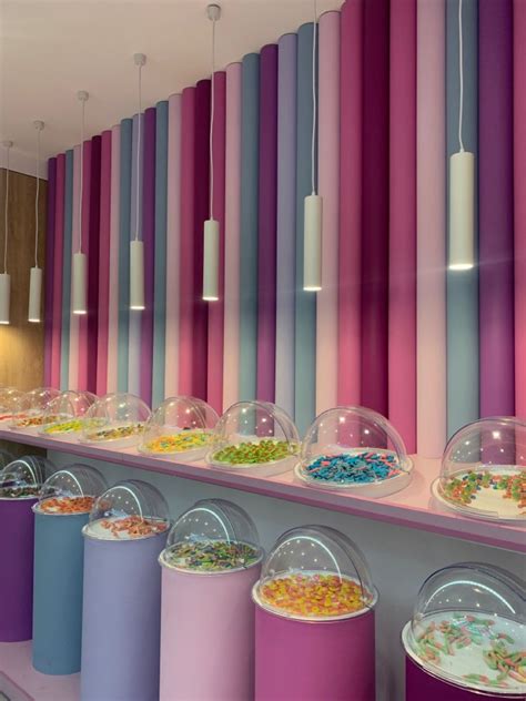 Colorful Candy Containers On Shelf