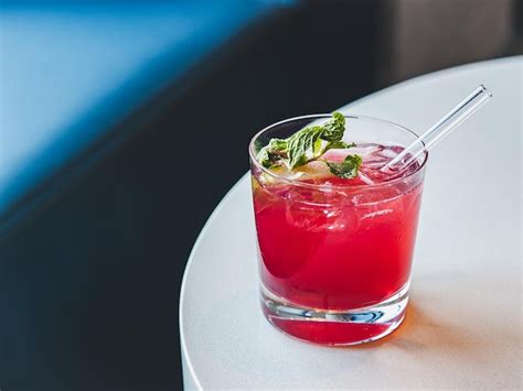 Premium Photo Beautiful Glass With A Refresh Cocktail Standing On A Table