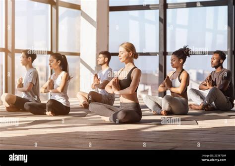 Meditation Session Group Of Diverse Sporty People Practicing Yoga In