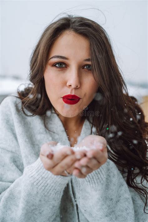 Portrait Of Attractive Young Woman With Long Dark Hair And Red Lips