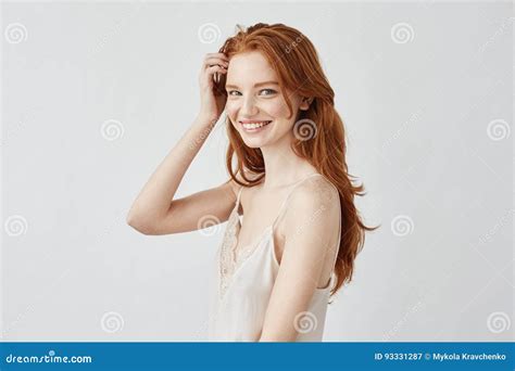 Beautiful Redhead Model With Freckles Smiling Looking At Camera Stock