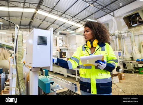 Woman Worker Operating Machine Hi Res Stock Photography And Images Alamy