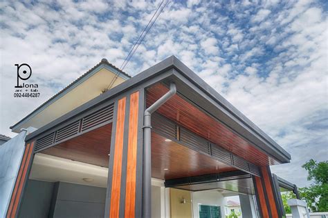 โรงจอดรถและกันสาดหลังคาเมทัลชีท ฝ้าระแนงลายไม้