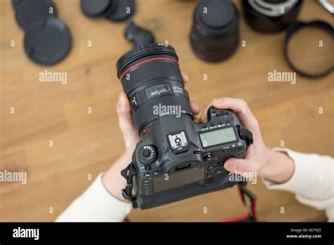 Hand Holding A Camera Stock Photo Alamy