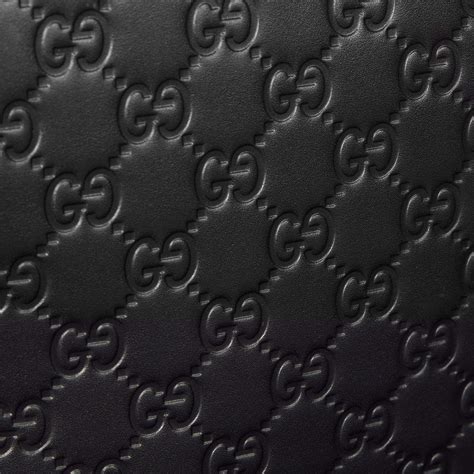 Gucci Gg Emblem Pouch Enigma Boutique