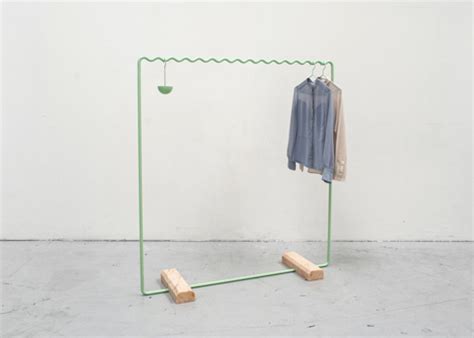 Wave Shaped Clothes Rails Keep Items Evenly Spaced