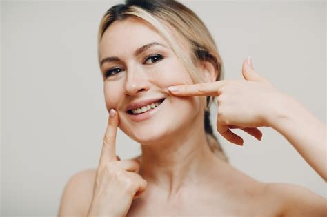 Premium Photo Young Adult Woman Doing Facial Gymnastics Self Massage