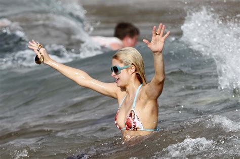 Paris Hilton Looking Sexy In Colorfull Bikini On Beach With Her