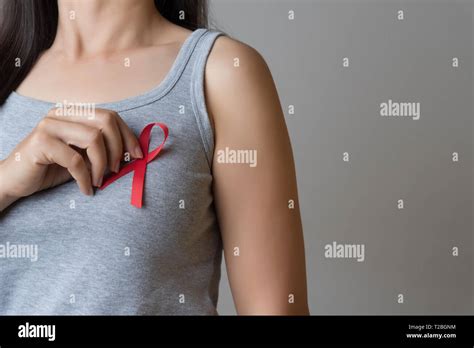 Closeup Woman Hand Holding Red Ribbon Hiv World Aids Day Awareness
