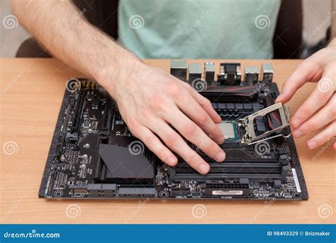 Plug In Cpu Microprocessor To Motherboard Socket Technological Background Concept Computers