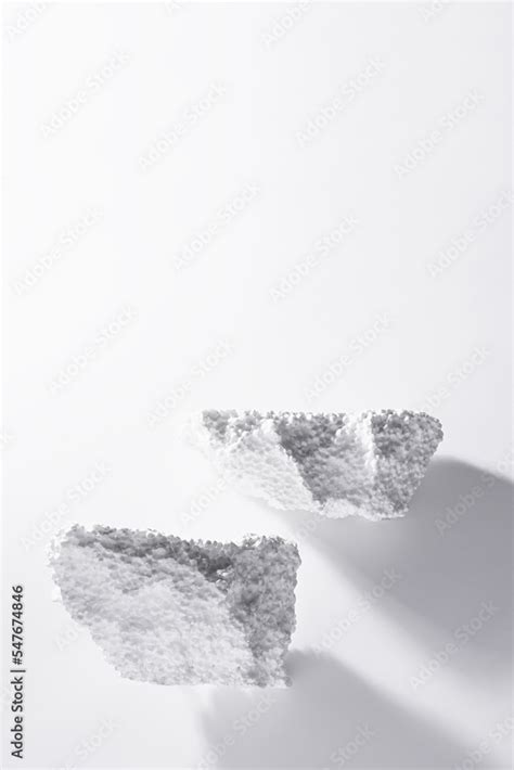 White Stage With Podiums Of Styrofoam As Rough Clouds Mockup Fly In