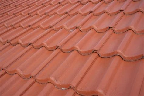 Way Of Fixing Tiles In Interlocking Joint [3] A On One Of Buildings