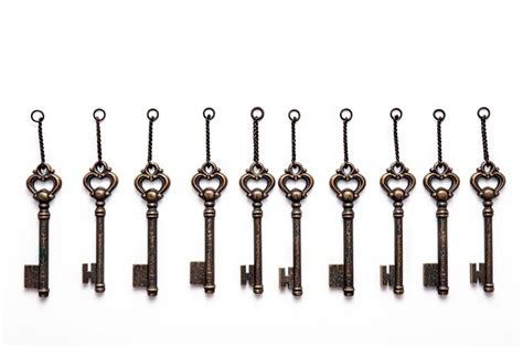 Premium Ai Image Rows Of Old Keys Hung On White Strings