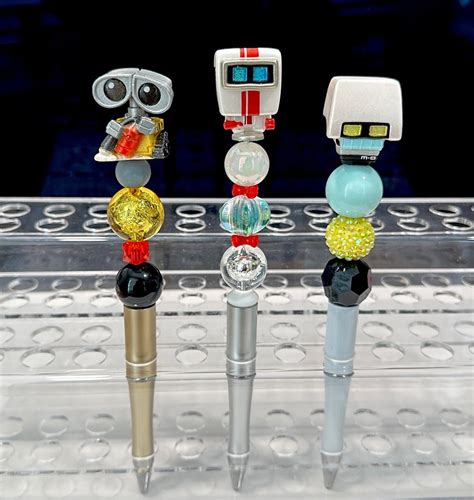 Doorable Wall E M O Rare Find And Burn E Ultra Rare Find Doorable Beaded Pens Disney Autograph