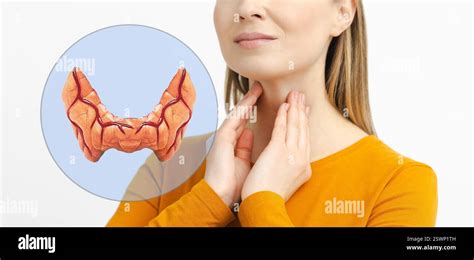 Woman Self Touching Her Neck To Check The Thyroid Gland With Close Up