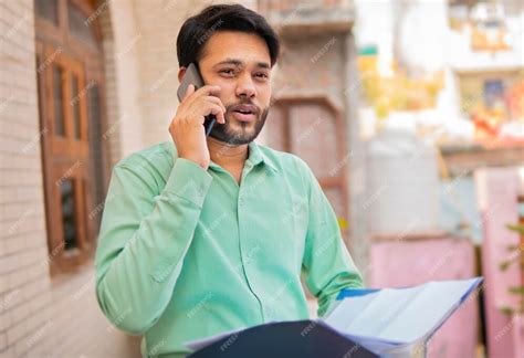 Premium Photo Young Man Using Mobile Phone