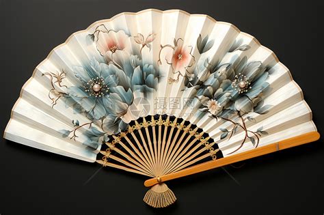 桌面上精美的扇子高清图片下载 正版图片601049243 摄图网