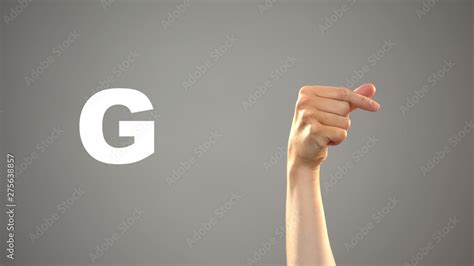 Letter G In Sign Language Hand On Background Communication For Deaf