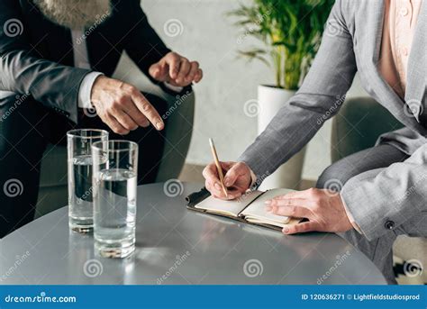 Cropped View Of Hands Of Business Colleagues Having Conversation Stock
