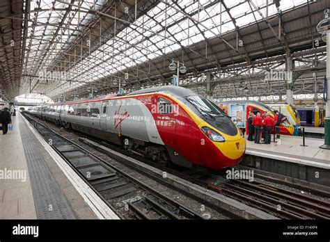 Virgin Trains Pendolino Train At Platform In Piccadilly Train Station
