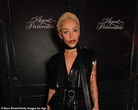 Doja Cat Sends Pulses Racing In Plunging Black Leather Dress As She