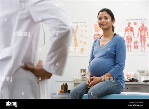 A Doctor And A Pregnant Patient Stock Photo Alamy